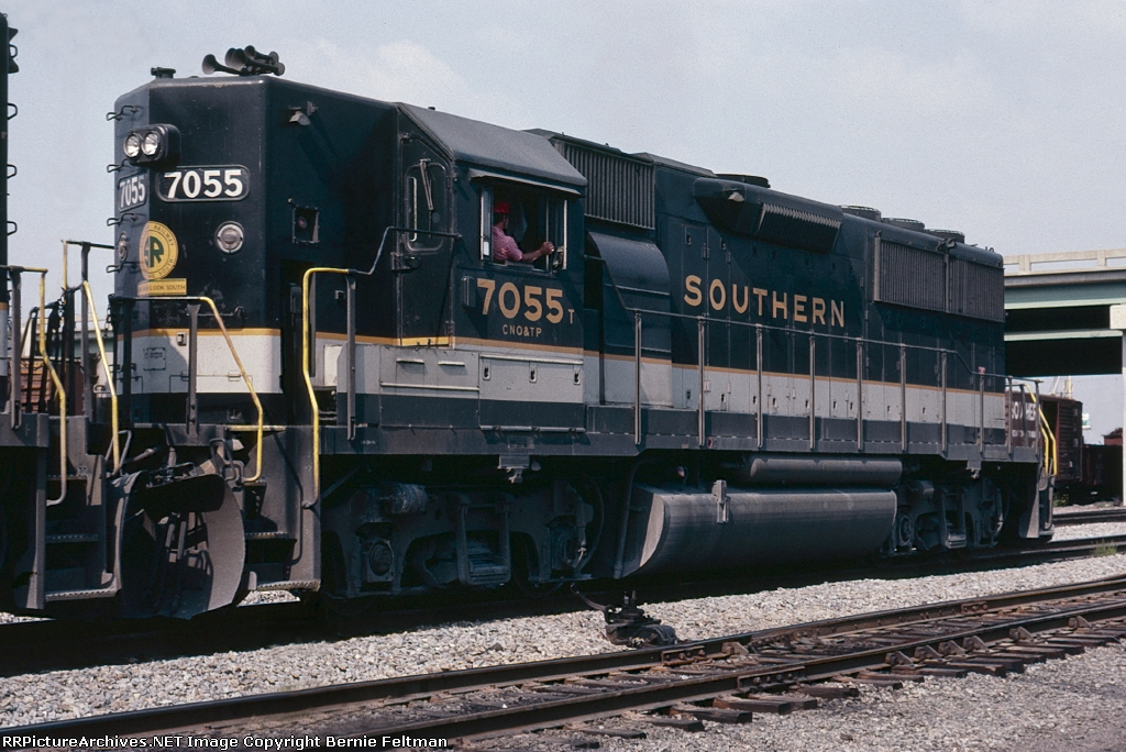 Southern Railway GP50 #7055, with two other GP50's leading an eastbound thru downtown,